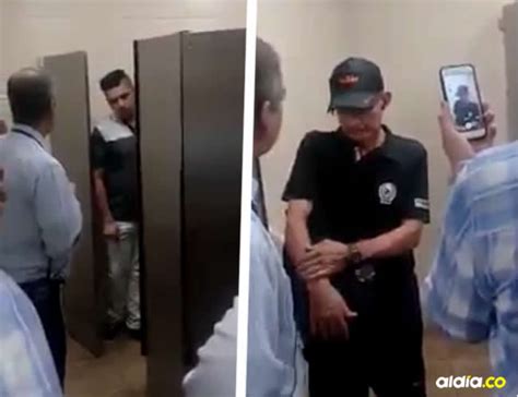 VIDEO Pillan a dos hombres teniendo sexo en el baño de un centro comercial Aldía co