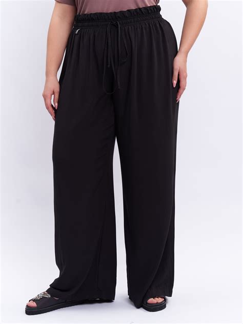 Штаны внизу на резинке для полных девушек — купить по низкой цене на Яндекс Маркете