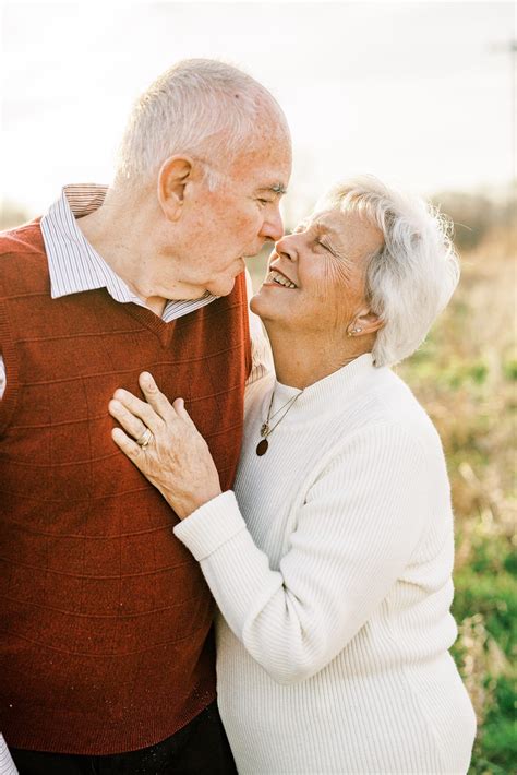 Couple Laughs During 50th Anniversary Photos In Field Dan And Becky