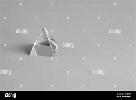 Crystal Pyramid On Gray Background Sharp Edges Mirrored Faces