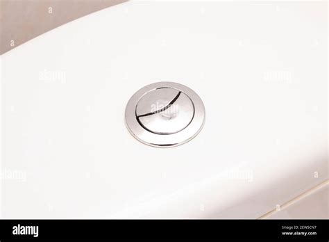 Flush Button On A White Toilet Closeup Stock Photo Alamy