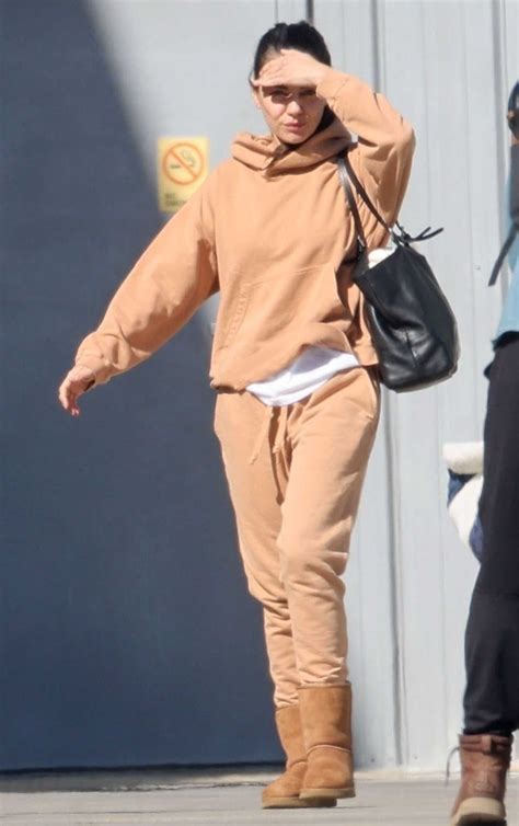 Mila Kunis In A Caramel Coloured Sweatsuit Returns From A Ski Trip In
