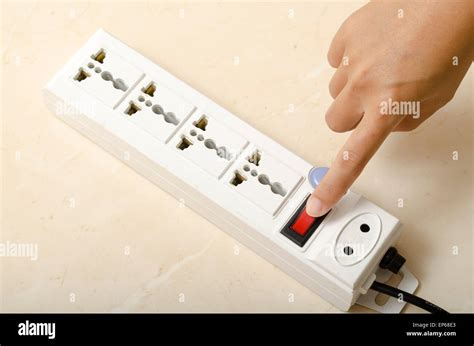 Asia Woman Hand Turn On Switch Multiple Socket Plug Electric Stock Photo Alamy