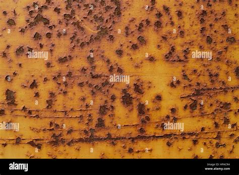 Rust Spots And Yellow Peeling Paint Stock Photo Alamy