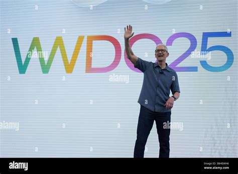 Apple Ceo Tim Cook Waves During An Event On The Apple Campus In