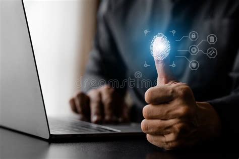 Businessman With A Laptop Hologram Icon Fingerprint Encryption