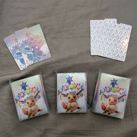 Games Prismatic Evolutions 3 Sealed Card Sleeve Packs And 1 Set Of