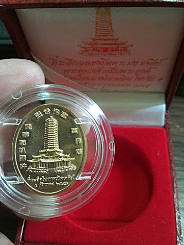 เหรียญเจ้าแม่กวนอิม ปางพันมือ ที่ระลึกในการเปิดเจดีย์ ๒๕๔๓ ตำหนักพระแม่กวนอิม โชคชัย ๔