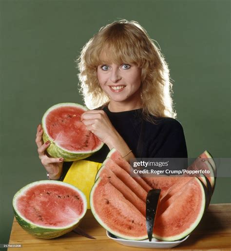 English Actress Liza Goddard Posed Cutting Up A Watermelon At Her
