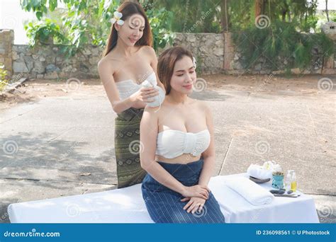 Two Asia Women Doing Spa Massage Together In Outdoor Stock Image