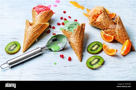 Summer Ice Cream Assortment Of Fruit Flavors With Kiwi And Pomegranate