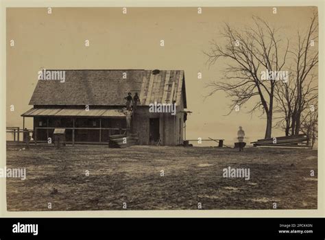 Workers Constructing A Wood Building Title Devised By Library Staff