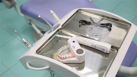 Model Of Jaw Glasses And Electrical Toothbrush Stock Footage Video