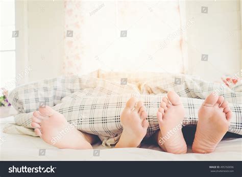Couple In Bed Feet Under Blanket Images Stock Photos Vectors Shutterstock