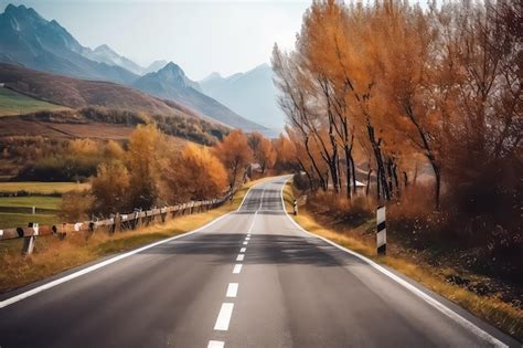 Premium Photo Asphalt Road Passing Through A Forest With Colorful