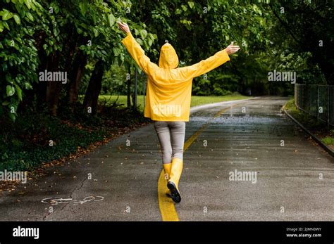 Back View Woman Rain Coat Stock Photo Alamy