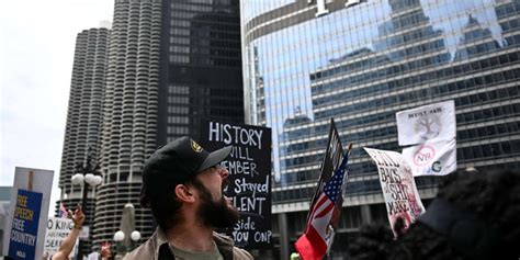 Chicago Protesters Direct Middle Fingers To Trump Tower