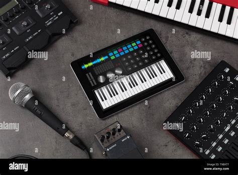 Piano Synthesizer App On Tablet And Musical Instrument Concept Stock