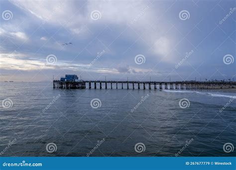 Drone Shot Of A Metallic Pier Of The Sea Under The Cloudy Sky Cool For