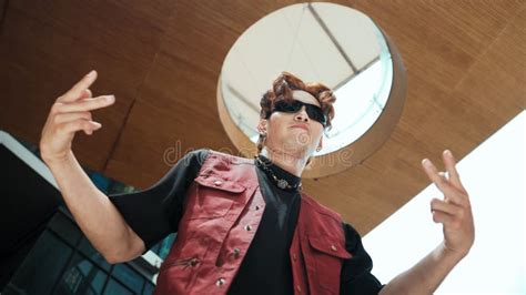 Modern Dancer Posing At Camera With Confident With Low Angle Camera