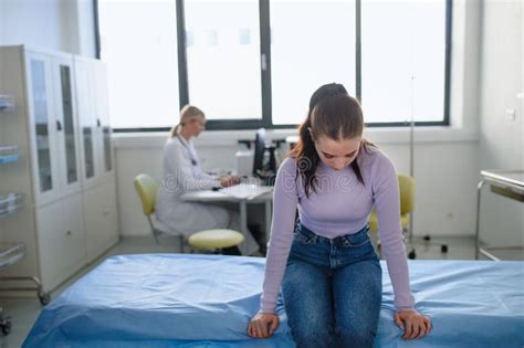 Unhappy Teenage Girl Sitting In Doctors Office Stock Photo Image Of Psychiatrist Doctor