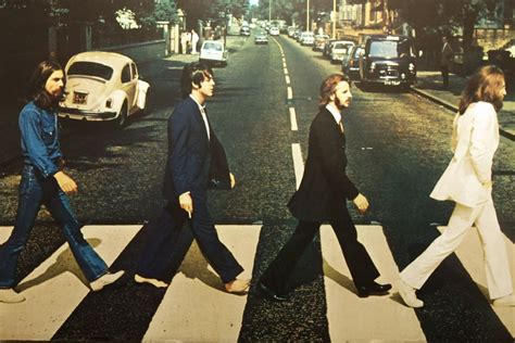 The Beatles 14 Iconic Photos Of The Band Including Abbey Road