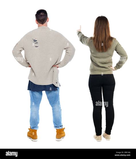 Back View Of Couple In Sweater Pointing Rear View People Collection