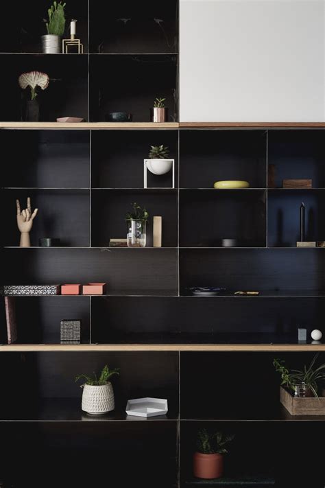 Storage In Israeli Home Allows Client To Display An Edited Selection Of Clutter