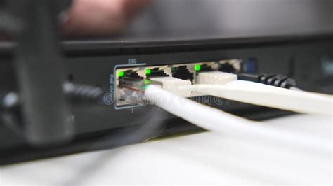 Woman S Hand Connects Internet Cable To Lan Wired Network Switch Internet Communication And