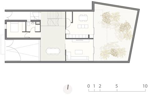 Ooiio Architectures Staggered And Stone Clad Block House