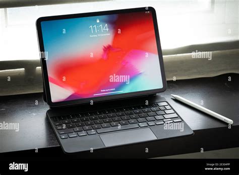 Apple Ipad Pro Inch With Magic Keyboard And Apple Pencil Stock Photo Alamy