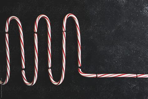 Candy Canes Flat Lining By Stocksy Contributor Evan Dalen Stocksy