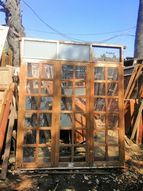 หน้าต่างกระจกทรงสูงไม้สัก 12ช่อง ชุด3บาน คอกระจก ขนาดกว้าง186x222cm มี1ขุด พร้อมล้างทำความสะอาด