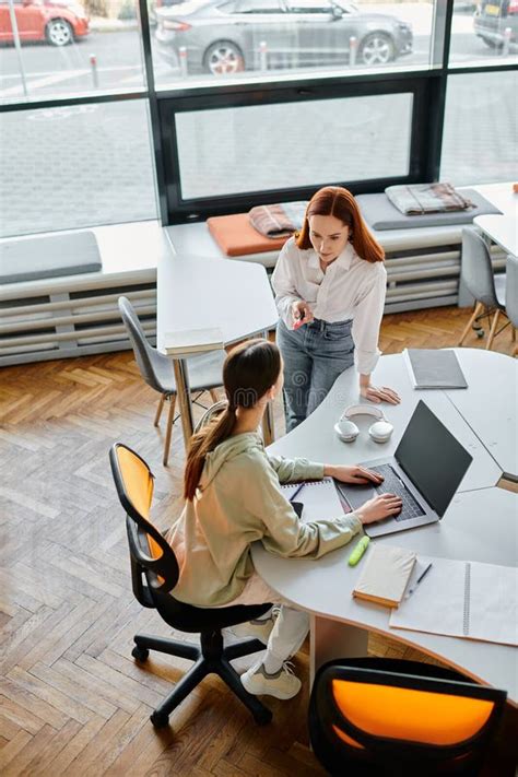 Redhead Tutor Teaching Teenage Girl In Stock Photo Image Of Knowledge Motivation