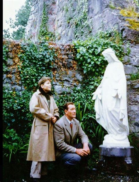 Awesome John Wayne And His Son Patrick At A Statue Of Mary In