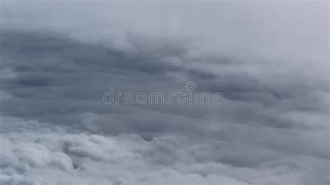 View Above The Clouds Showcasing A Textured Sea Of White Formations