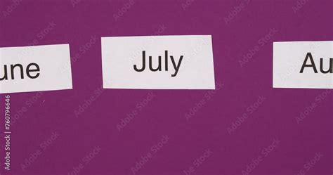 Month Names Changing On Purple Paper Background Time Passing Calendar