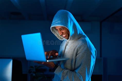 night black man or hacker phishing on laptop for cybercrime malware