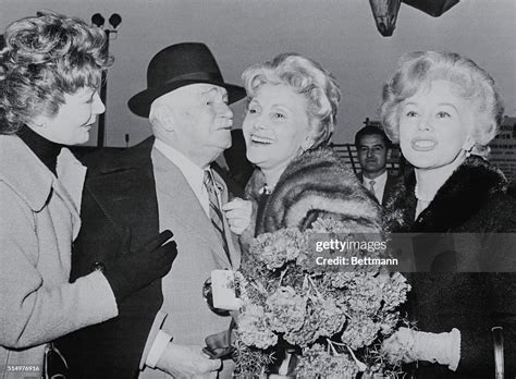 Eva Gabor And Sister Magda Embrace Their Father Vilmos Gabor During News Photo Getty Images