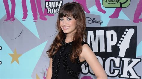 Watch Demi Lovato Recreate Iconic Camp Rock Pose At Dis KNEE Land ABC Audio Digital Syndication