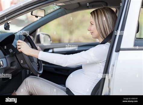 Pregnant Woman Driving Her Car Stock Photo Alamy