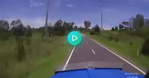 Dashcam Catches Near Miss Idiot Trying To Overtake A Road Train On A