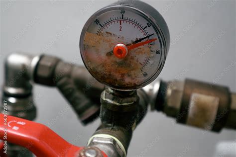 Damaged Manometer Bad Pressure Gauge In The Pipeline Metallic Pressure Sensor Stock Photo