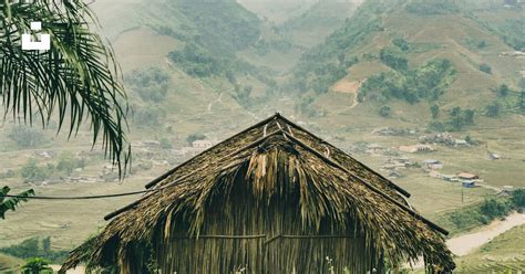Brown Nipa Hut Near Mountain Photo Free Vietnam Image On Unsplash