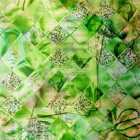 A Green Patchwork Quilted Background Showing Square Pattern Designs