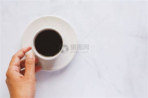 手握咖啡杯高清图片下载 正版图片502546092 摄图网