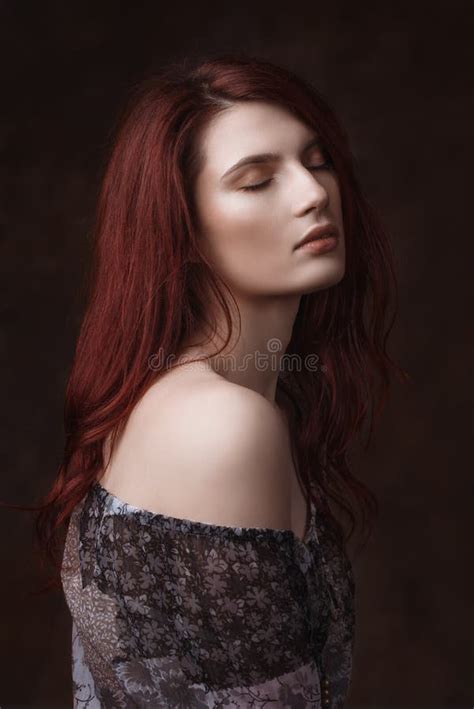 Dramatic Retro Portrait Of A Young Beautiful Dreamy Redhead Woman Soft