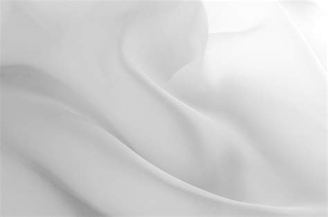 텍스처 배경 패턴입니다 실크 직물은 투명 하 고 색깔에서 백색 이다 추상 부드러운 쉬폰 질감 배경입니다 커브와 웨이브 부드러운 화이트 시 폰 0명에 대한 스톡 사진 및 기타