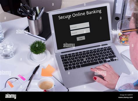 Woman Working On Computer With Secure Online Banking Stock Photo Alamy