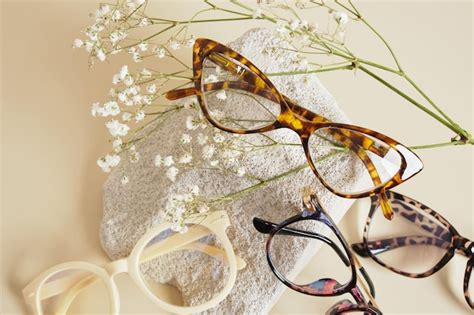 Premium Photo Several Different Trebdy Eye Glasses With Fashion Frames And Concrete Podium On